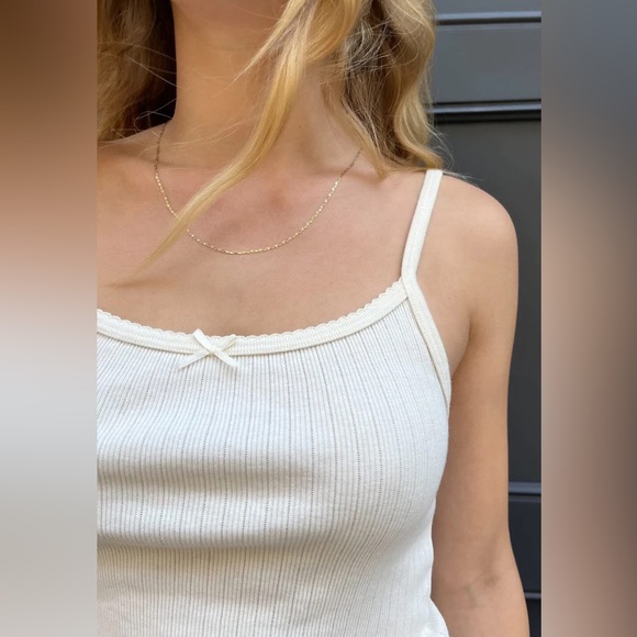 Brandy Melville | Tops | Brandy Melville Cream Belle Bow Tank Top ...